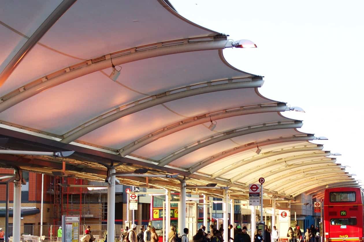 Tensile fabric walkway canopy at bus station - Architen Landrell